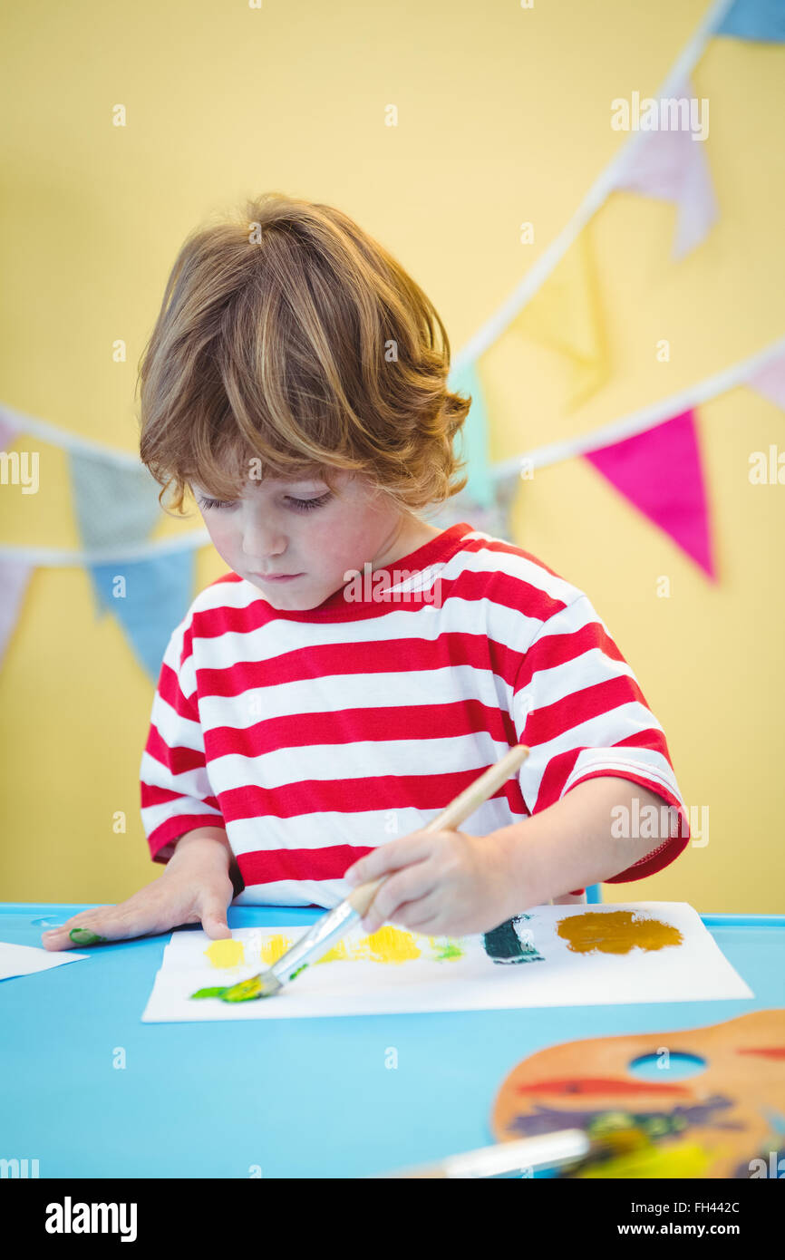 Child painting a beautiful picture Stock Photo - Alamy
