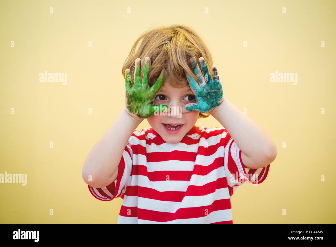 Paint covered hands hi-res stock photography and images - Alamy