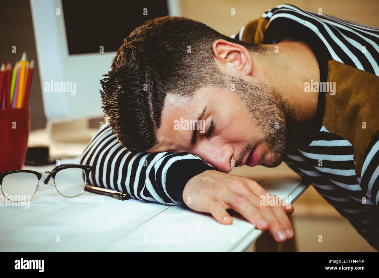 Man asleep at his desk Stock Photo - Alamy