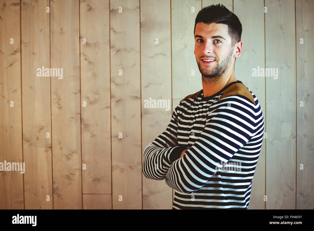 Handsome hipster posing for camera Stock Photo - Alamy
