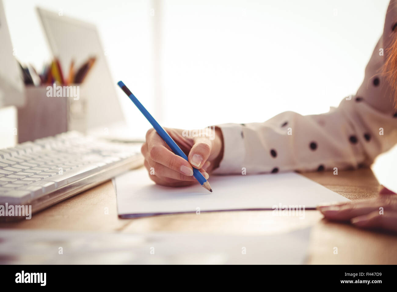 Cropped image of woman drawing Stock Photo - Alamy
