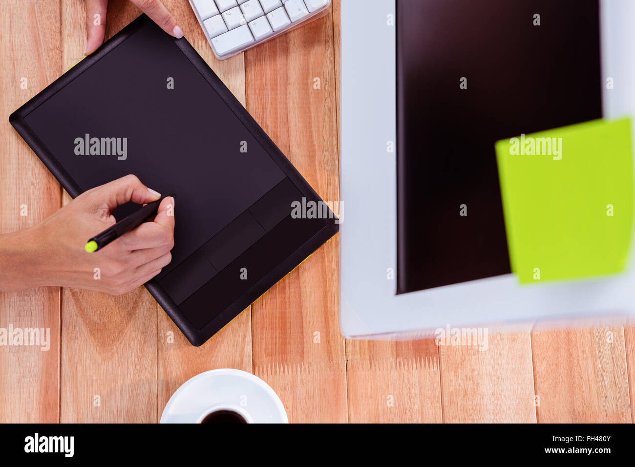 Part of hand using stylus Stock Photo - Alamy