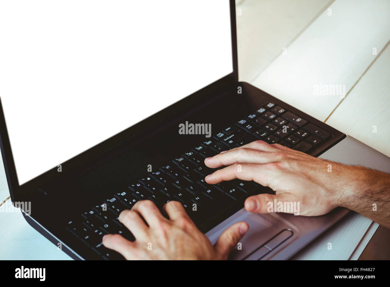Man using his laptop Stock Photo - Alamy