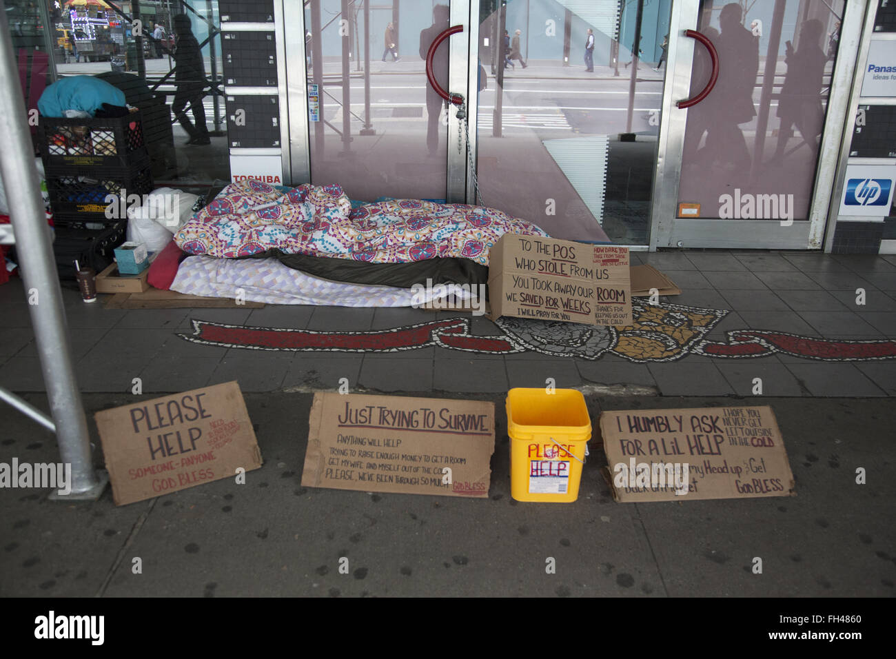 Homeless person at his encampment on 5th Avenue in midtown Manhattan ...