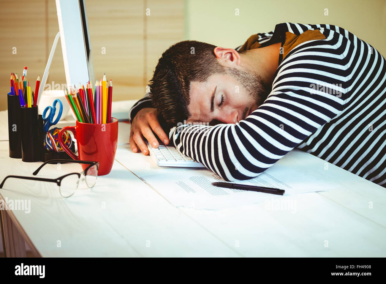 Man asleep at his desk Stock Photo - Alamy