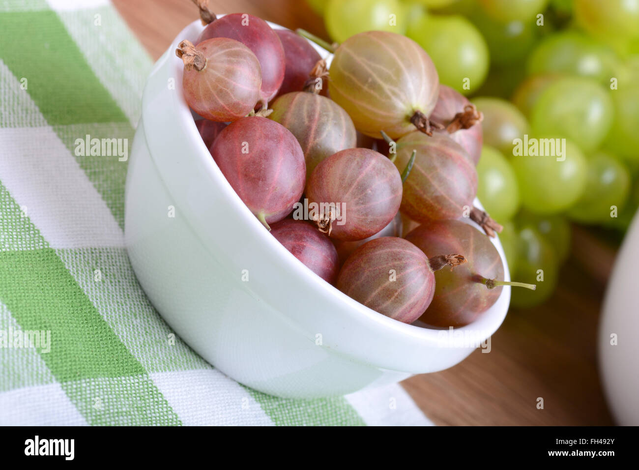 gooseberry and grapes health food concept Stock Photo - Alamy
