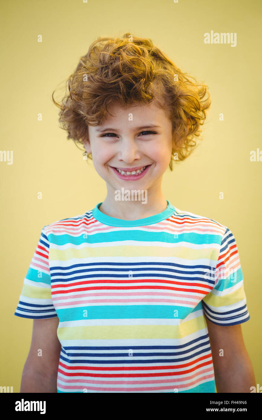 Smiling boy looking at the camera Stock Photo - Alamy