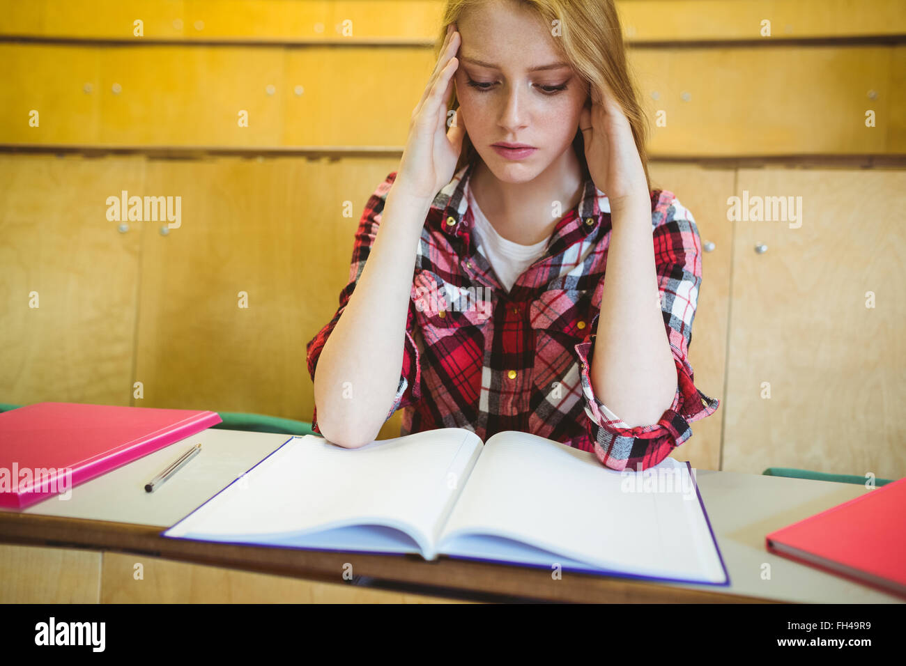 Focused student studying on notebook Stock Photo - Alamy
