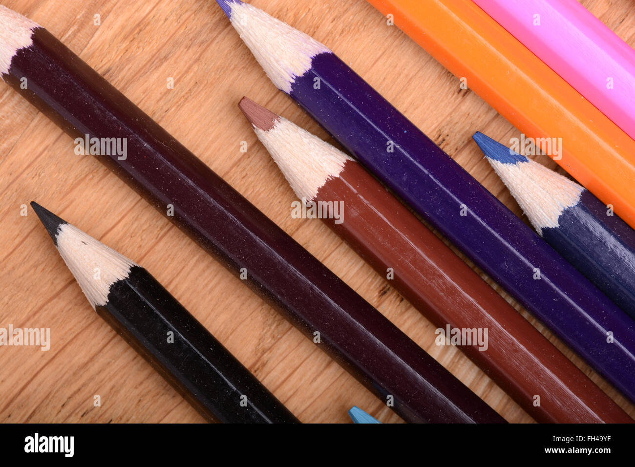 Frame of old Colour pencils on Old wooden plate texture background ...