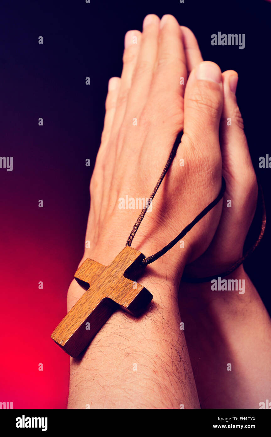 Man Praying At Cross