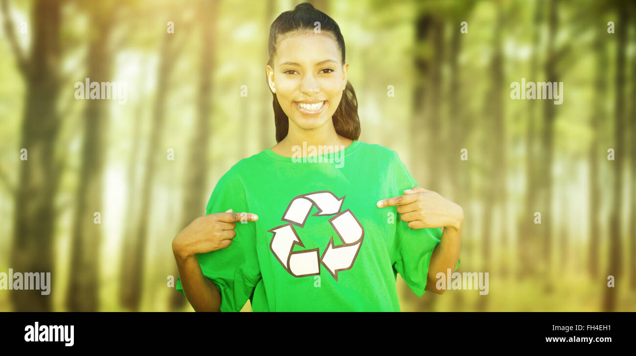 Composite image of happy environmental activist in the park Stock Photo ...
