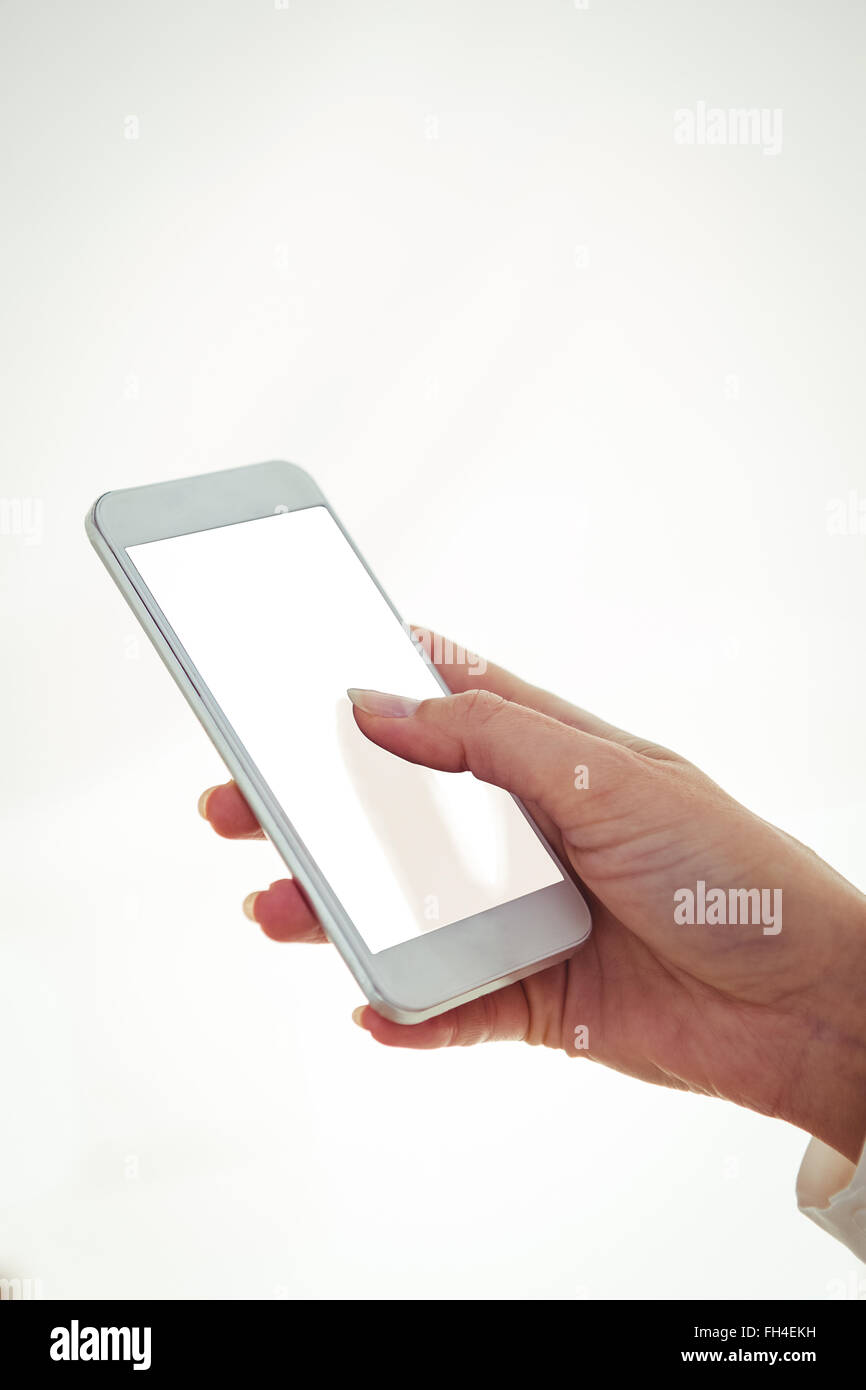 Cropped hand using smartphone Stock Photo - Alamy