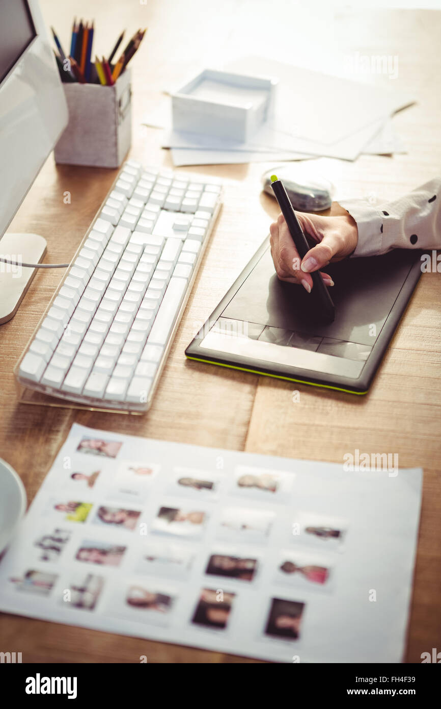 Cropped image of woman using graphics tablet Stock Photo - Alamy