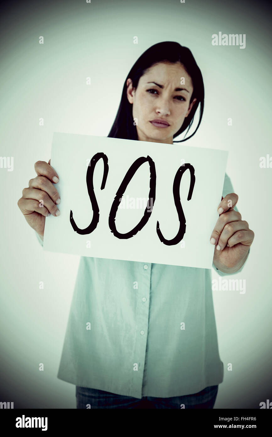 Composite image of sad woman showing sign Stock Photo - Alamy