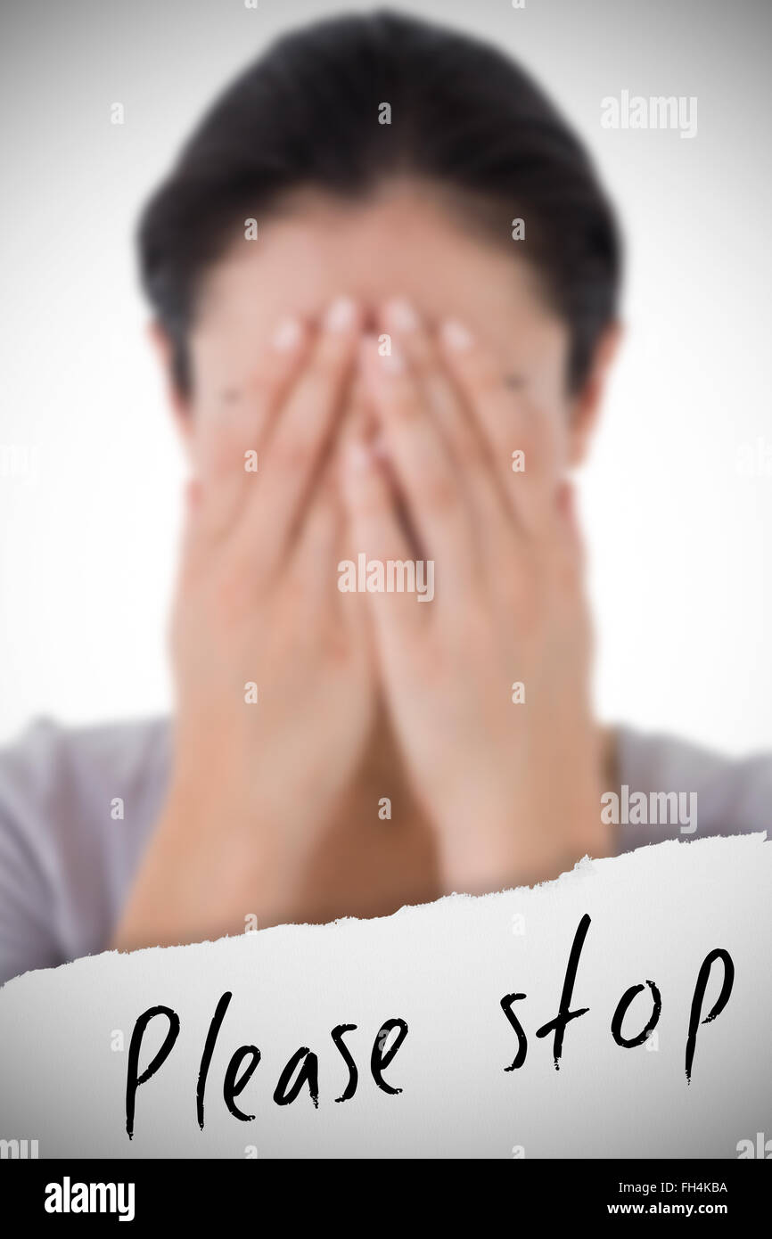 Composite image of sad woman hiding her face Stock Photo - Alamy