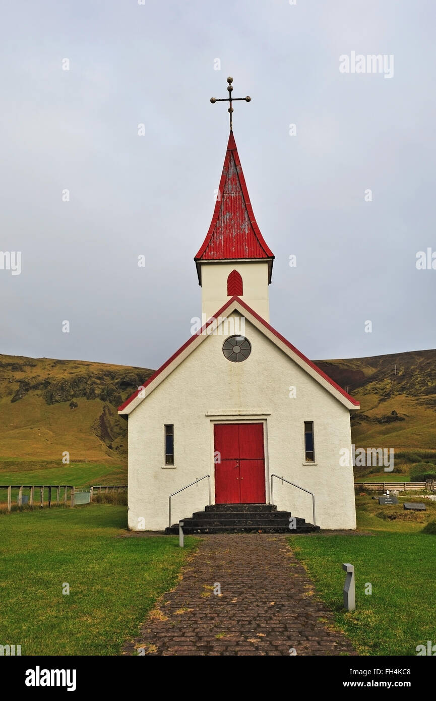 Old red wooden Lutheran church near Vik beach, Reynisfjara, Iceland ...