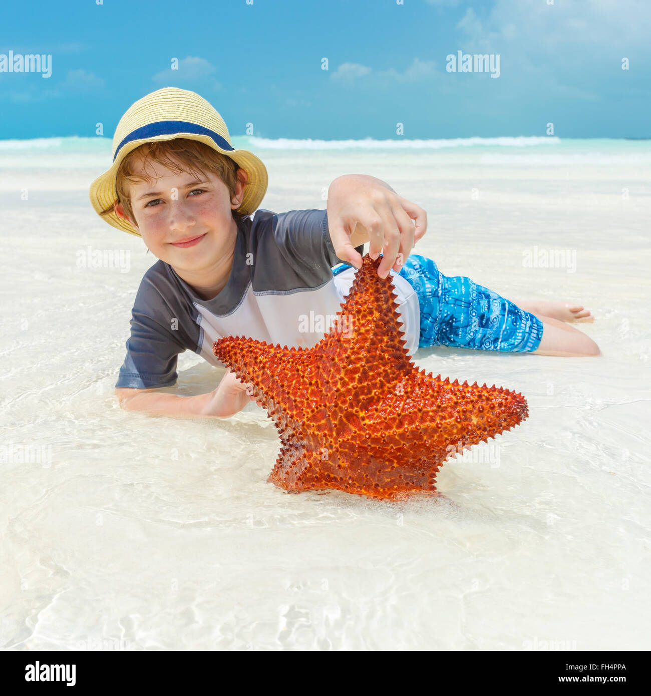 Boy on a fish hi-res stock photography and images - Alamy
