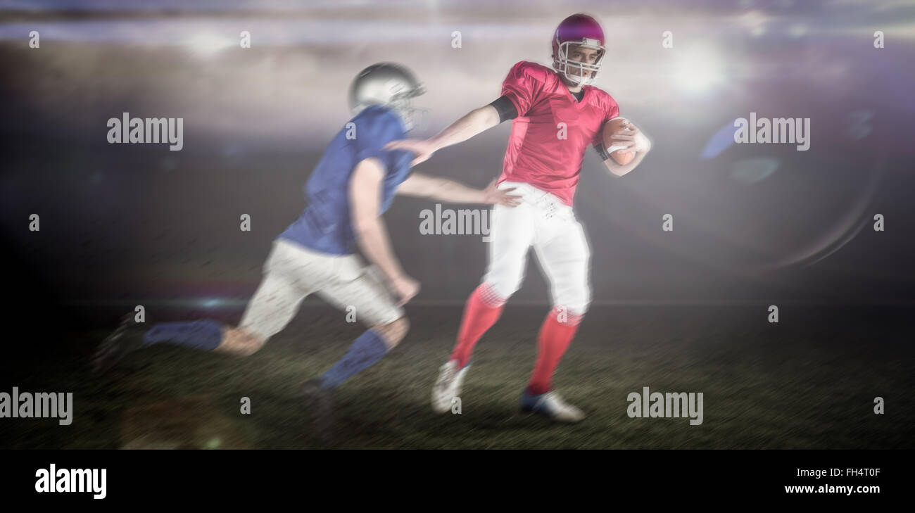 Composite image of american football players Stock Photo - Alamy