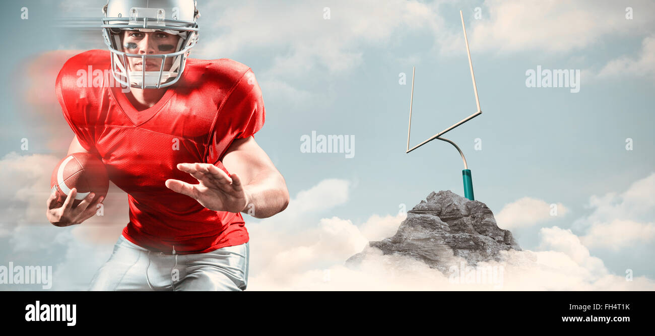 Composite image of portrait of defensive sportsman holding american ...