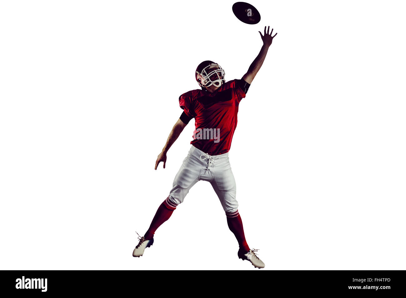 American football player trying to catch football Stock Photo - Alamy