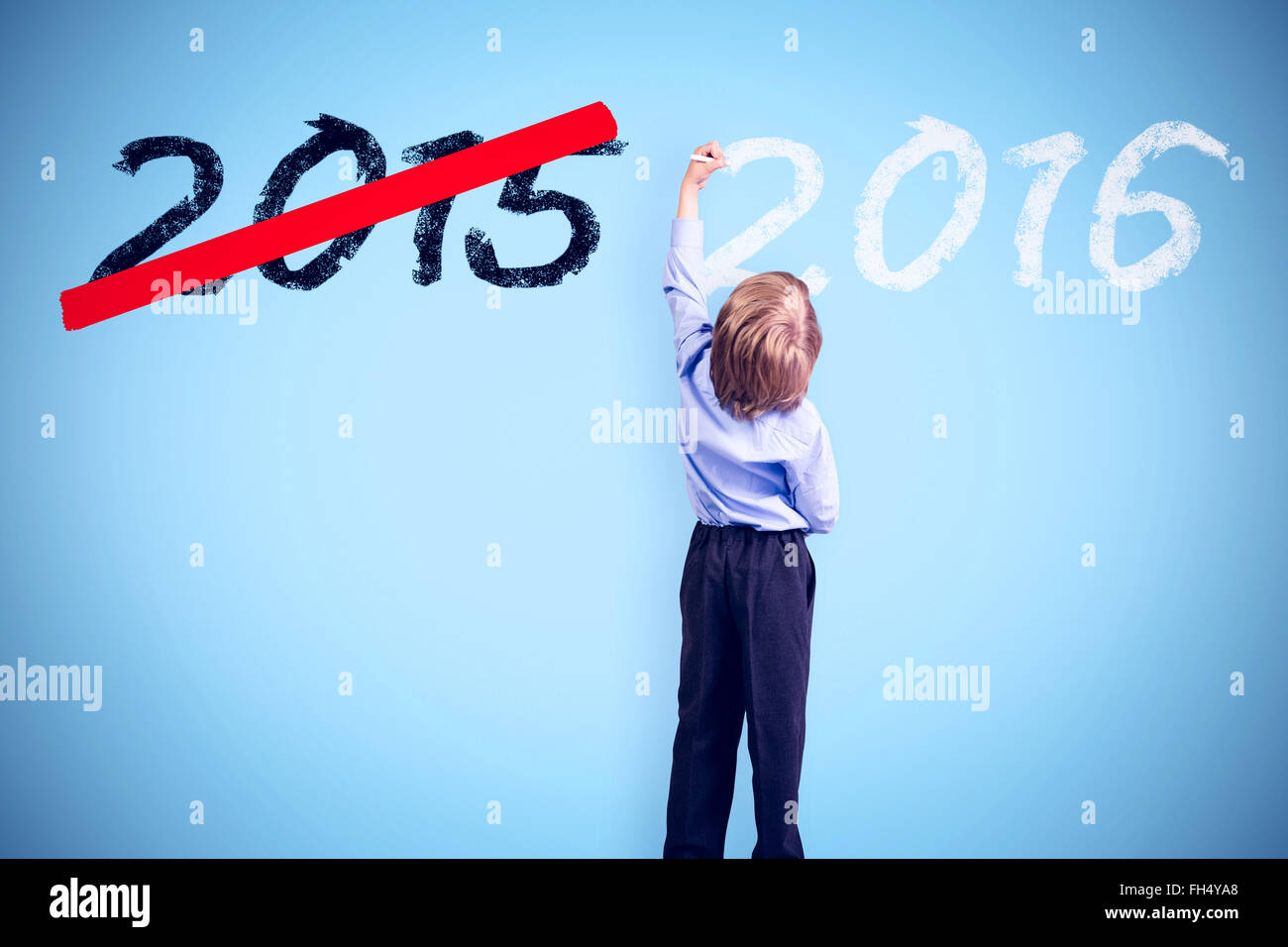 Composite image of cute pupil writing Stock Photo - Alamy