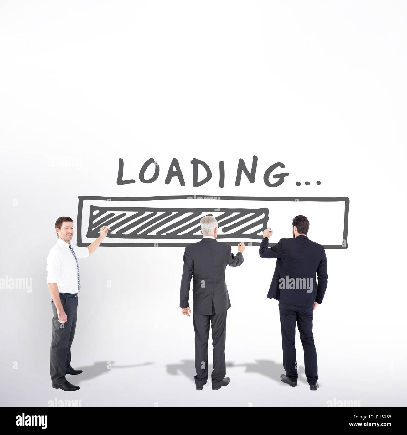 Composite image of business team writing Stock Photo - Alamy