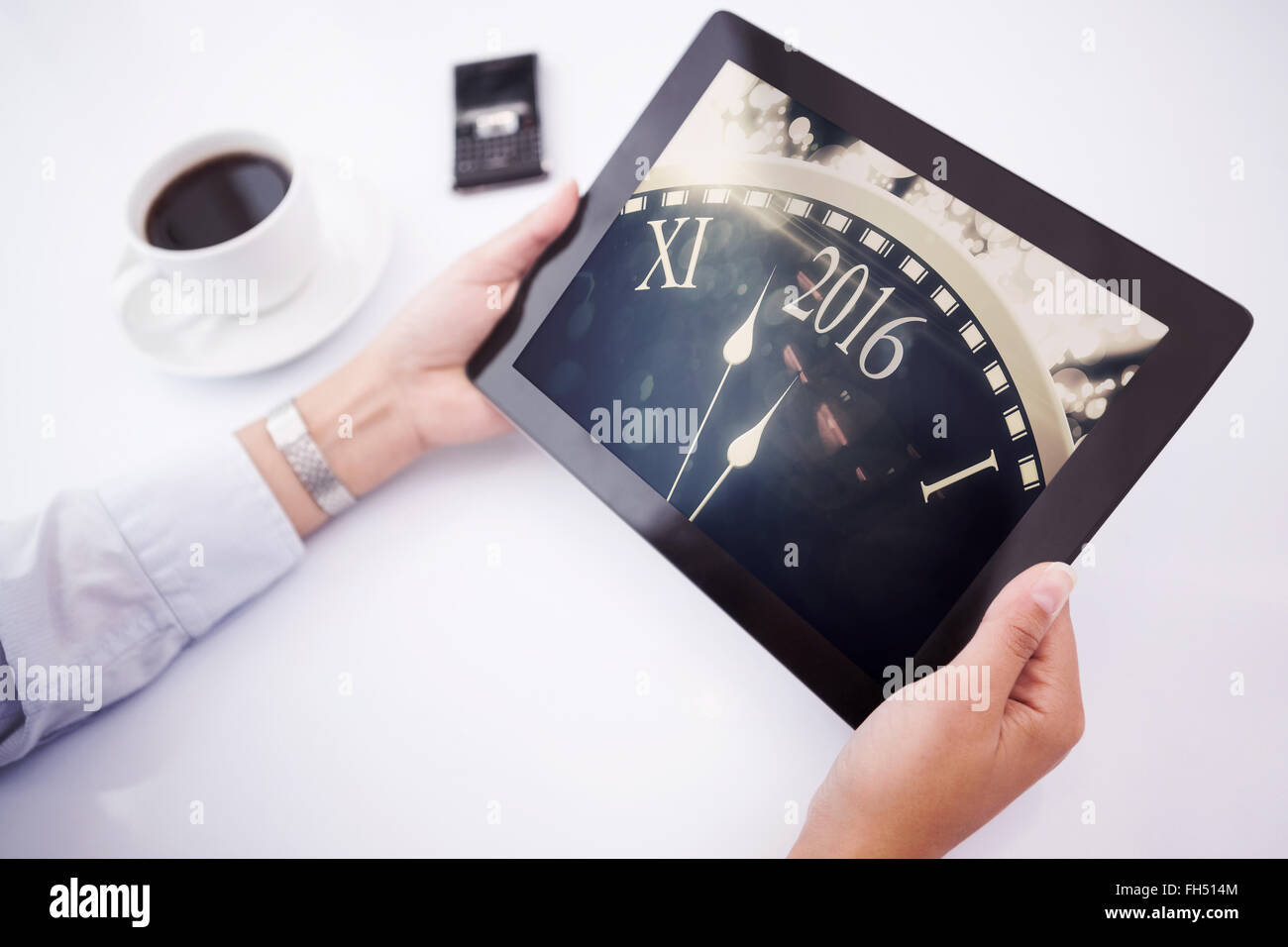Composite image of man using tablet pc Stock Photo - Alamy