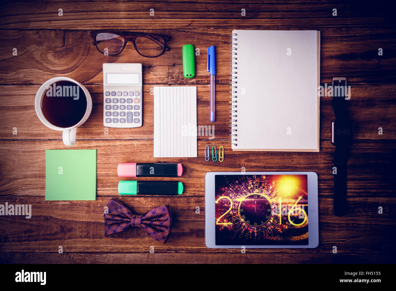 Composite image of overhead of students desk Stock Photo - Alamy