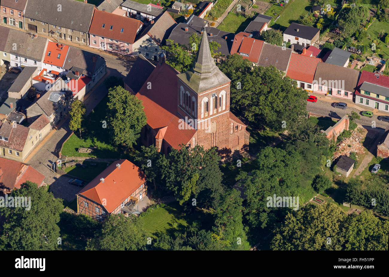 Aerial view, church and parish hall Johannis II, street village Lassan ...