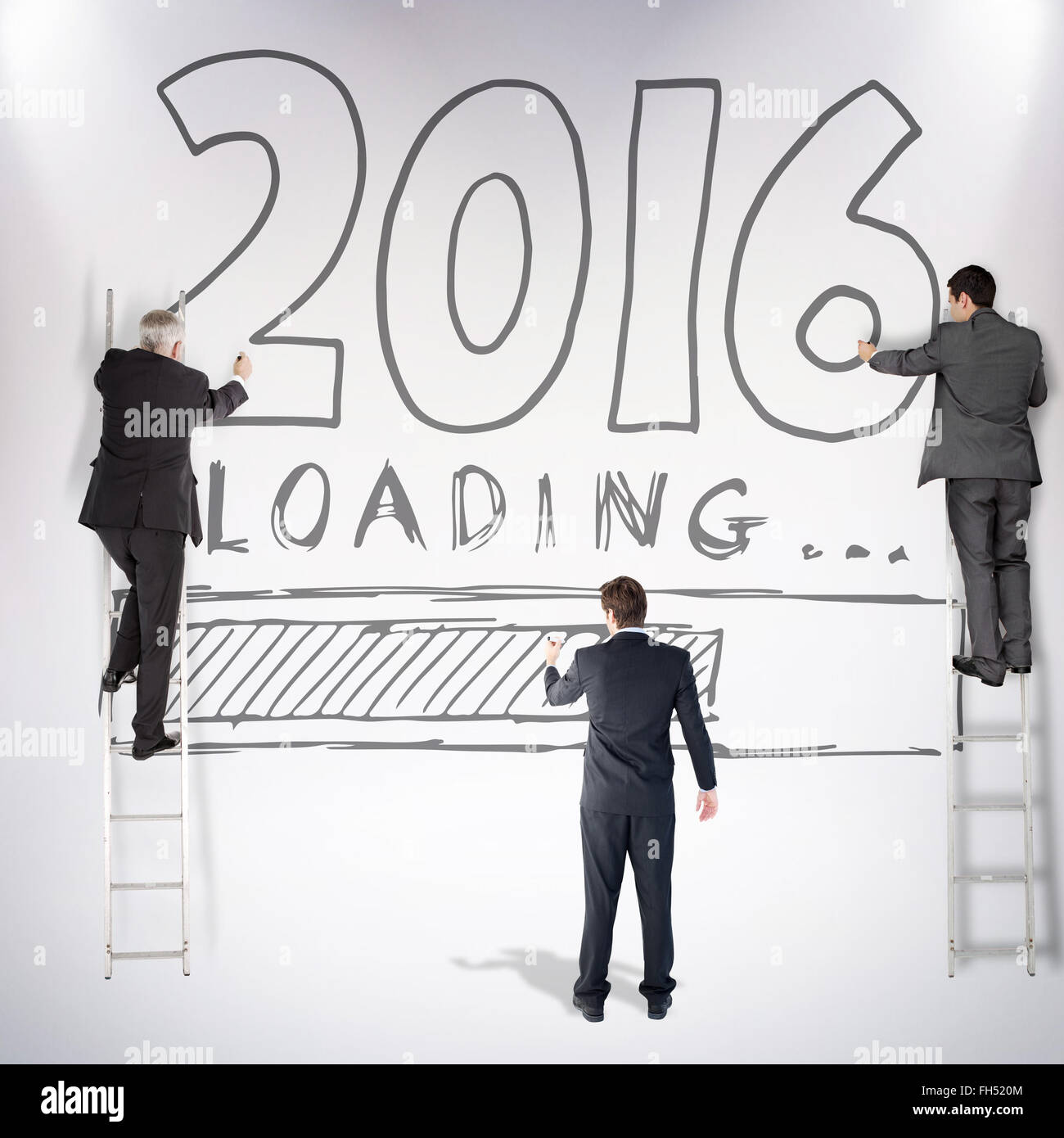 Composite image of business team writing Stock Photo - Alamy