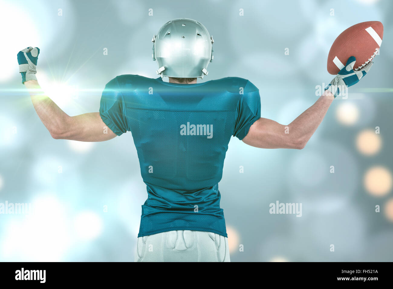 American football player flexing muscles hi-res stock photography and ...