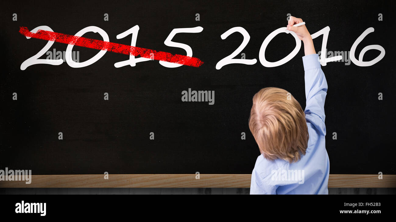 Composite image of cute pupil writing Stock Photo - Alamy