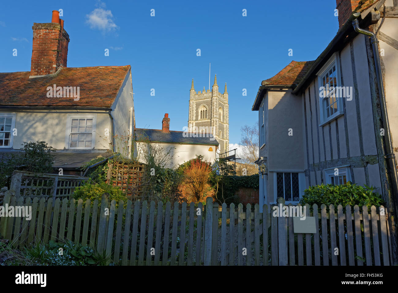 View over rooftops towards the church in the picturesque village of ...