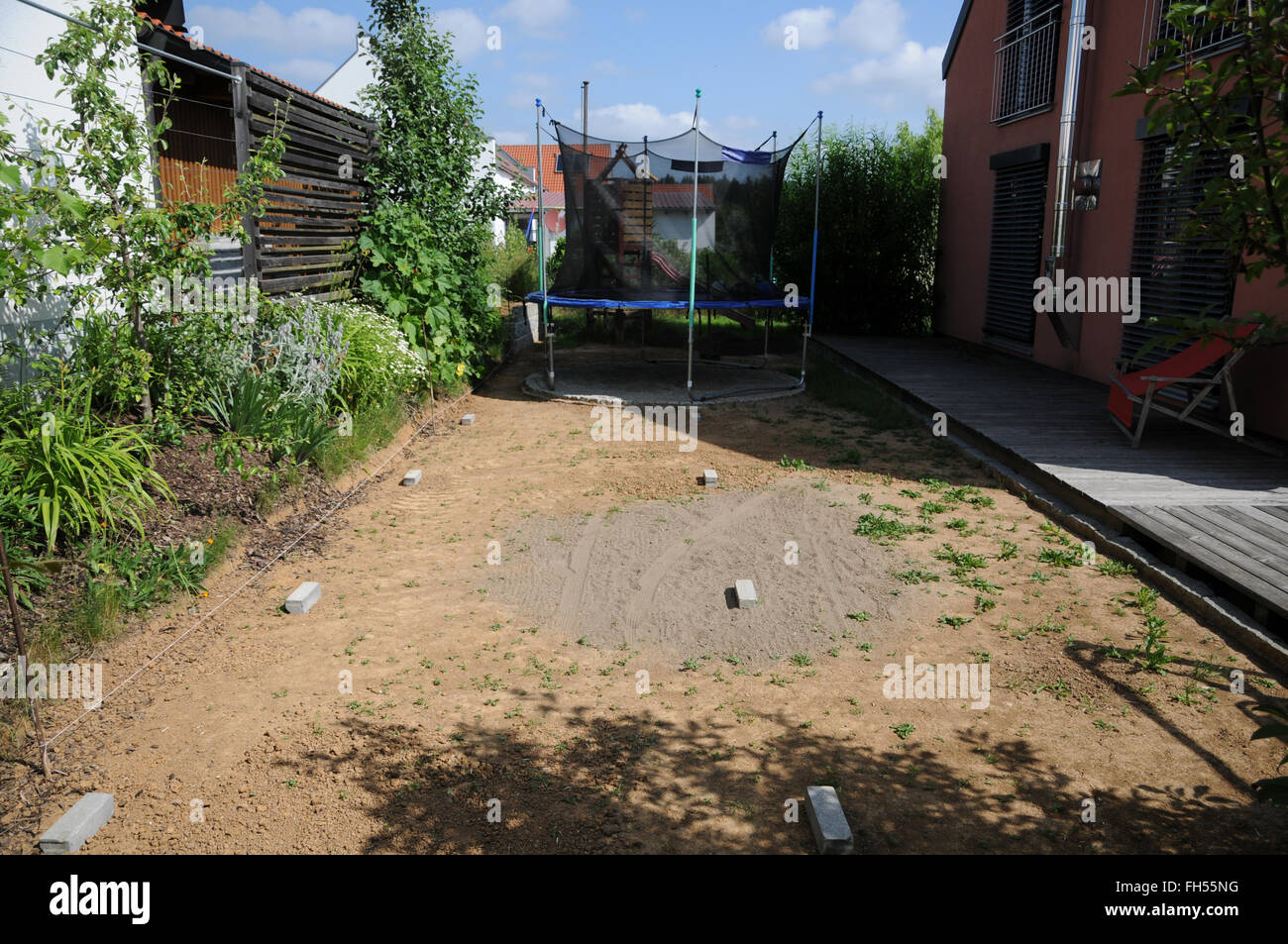 Laying sod, preparing soil Stock Photo - Alamy