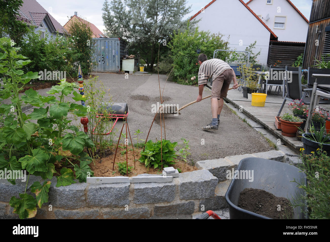 Laying sod, preparing soil Stock Photo - Alamy