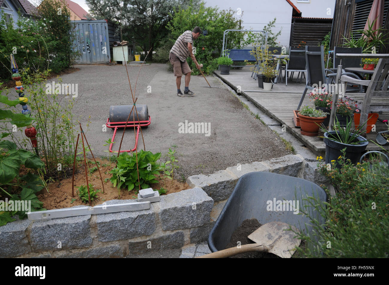 Laying sod, preparing soil Stock Photo - Alamy