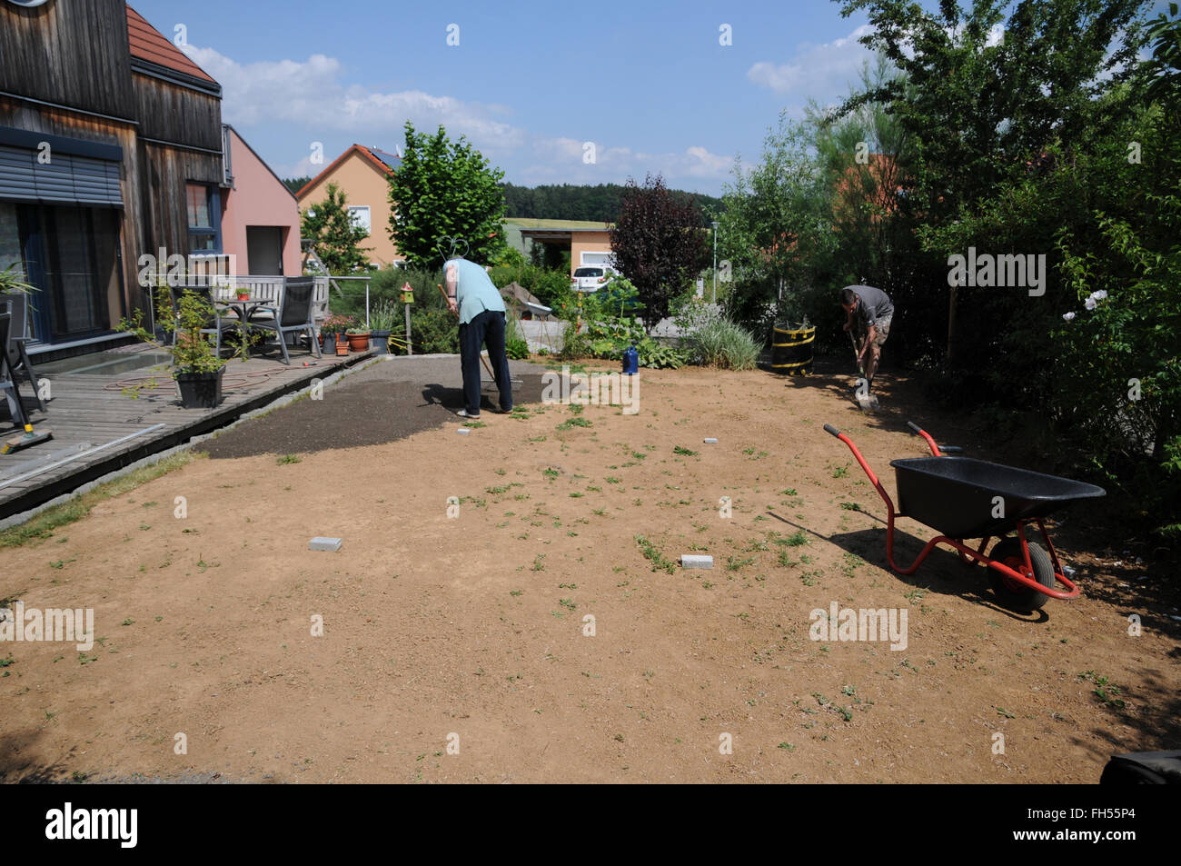 Laying sod, preparing soil Stock Photo - Alamy