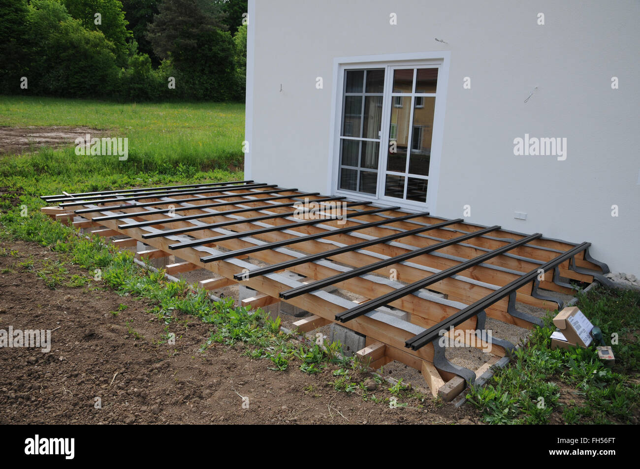 Building a wooden deck Stock Photo - Alamy