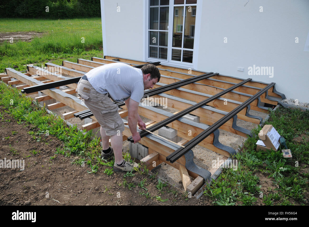 Building a wooden deck Stock Photo - Alamy