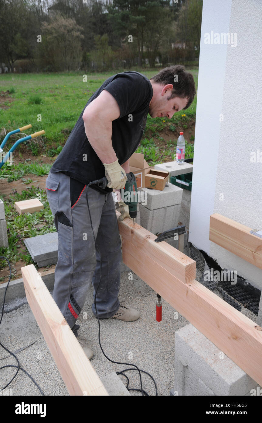 Building a wooden deck Stock Photo - Alamy