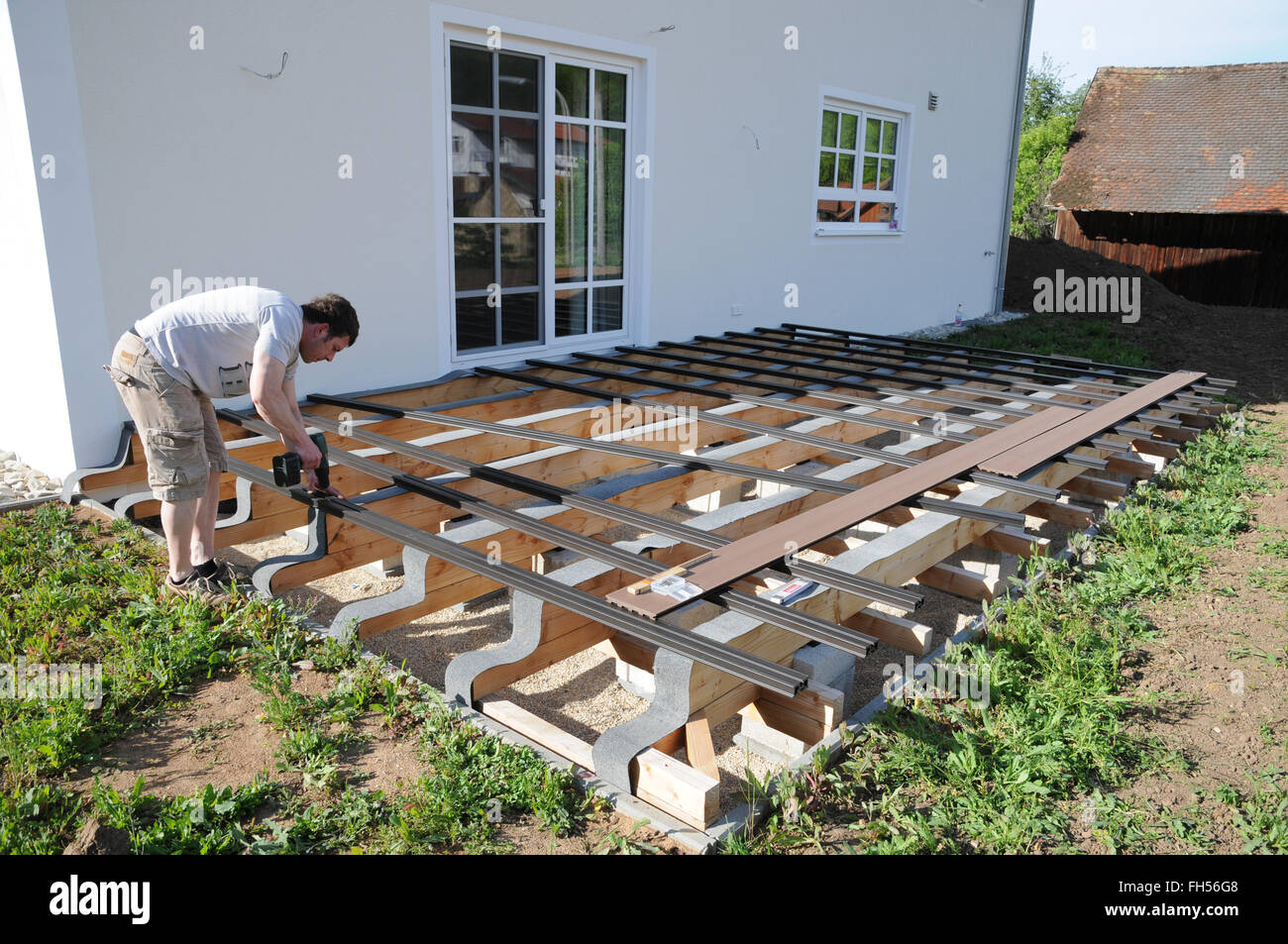 Building a wooden deck Stock Photo - Alamy