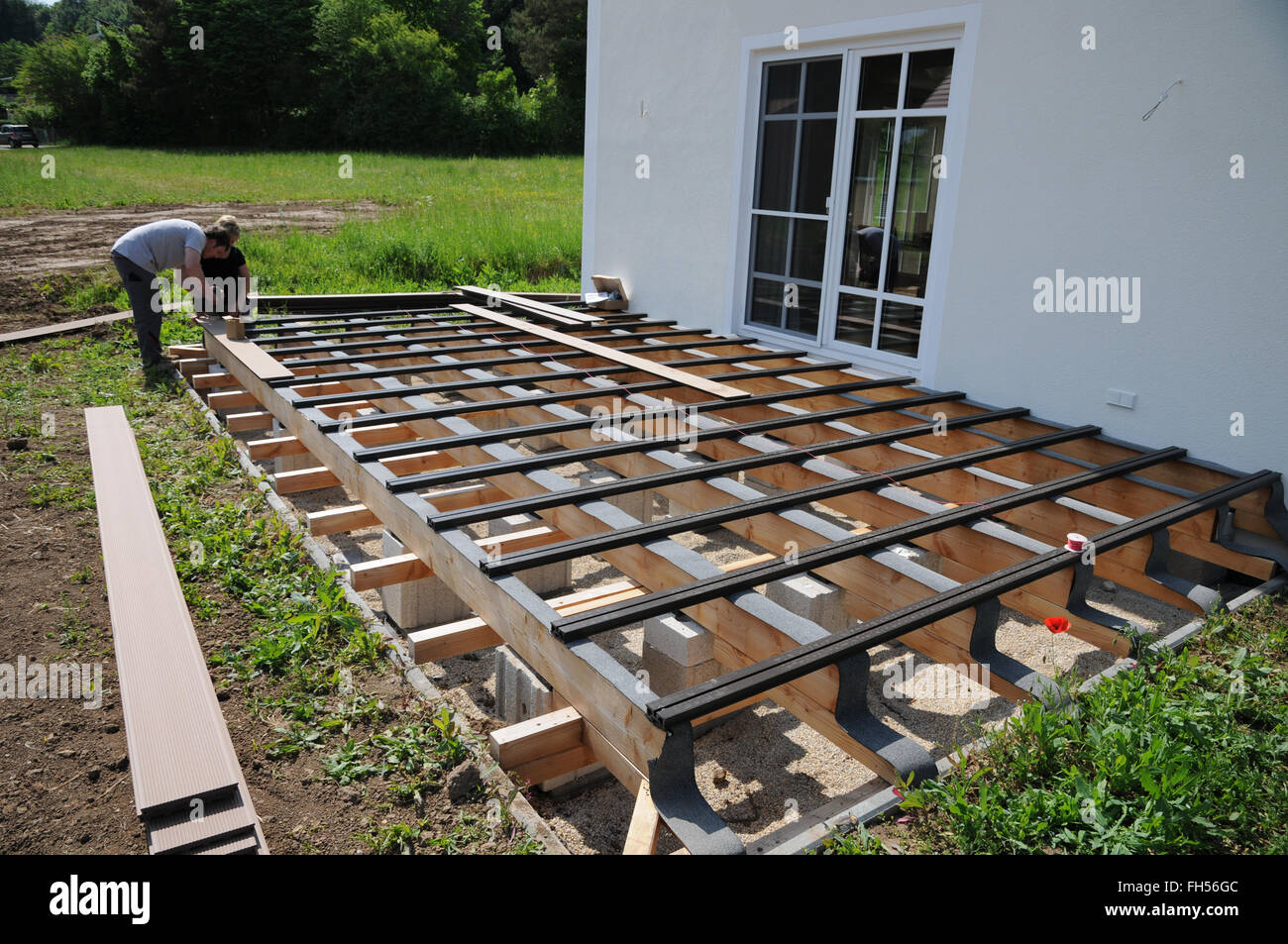 Building a wooden deck Stock Photo - Alamy