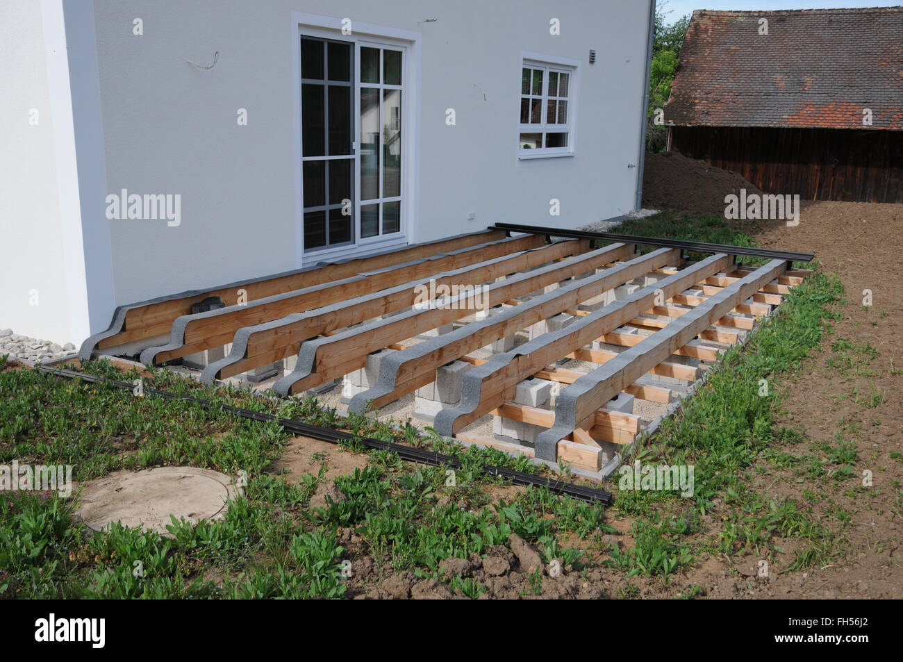 Building a wooden deck Stock Photo - Alamy