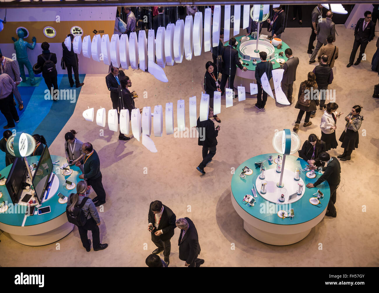 Catalonia, Spain, 23rd February, 2016. Attendees visit the SK telecom ...