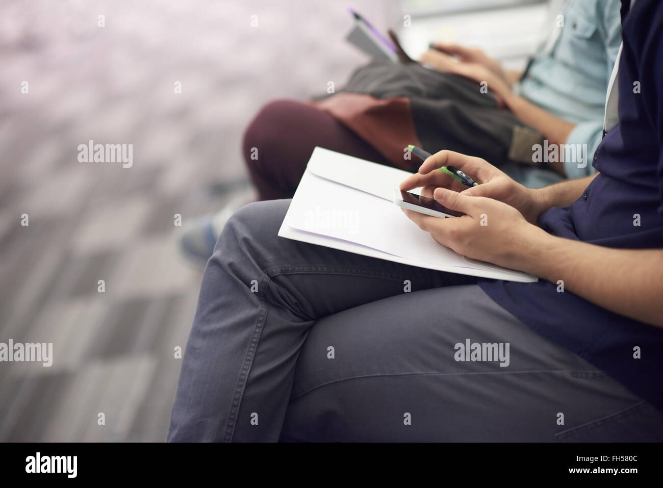 taking notes on business conference Stock Photo - Alamy