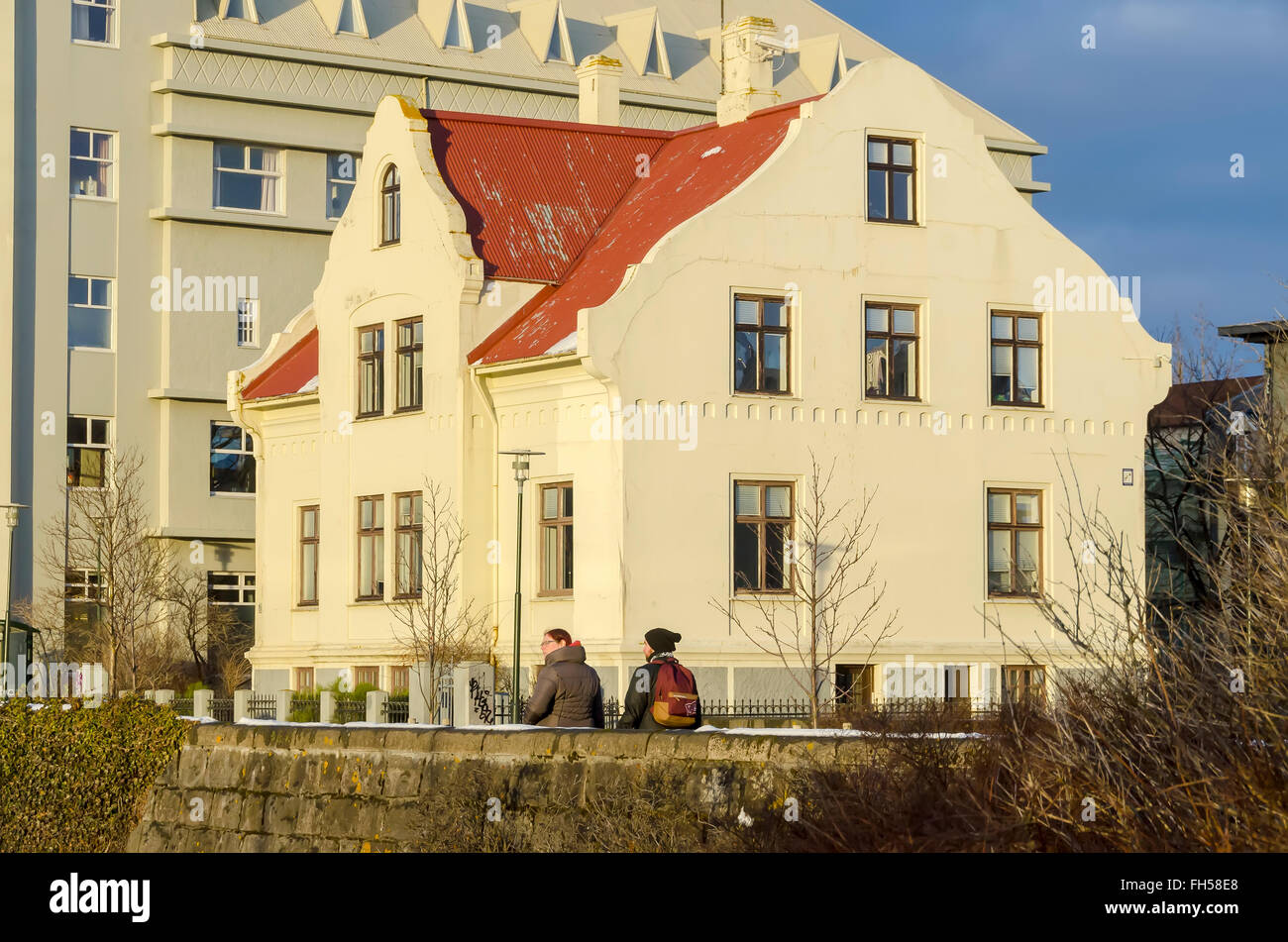 Reykjavik Old City contrast old-style building beside modern skyscraper ...