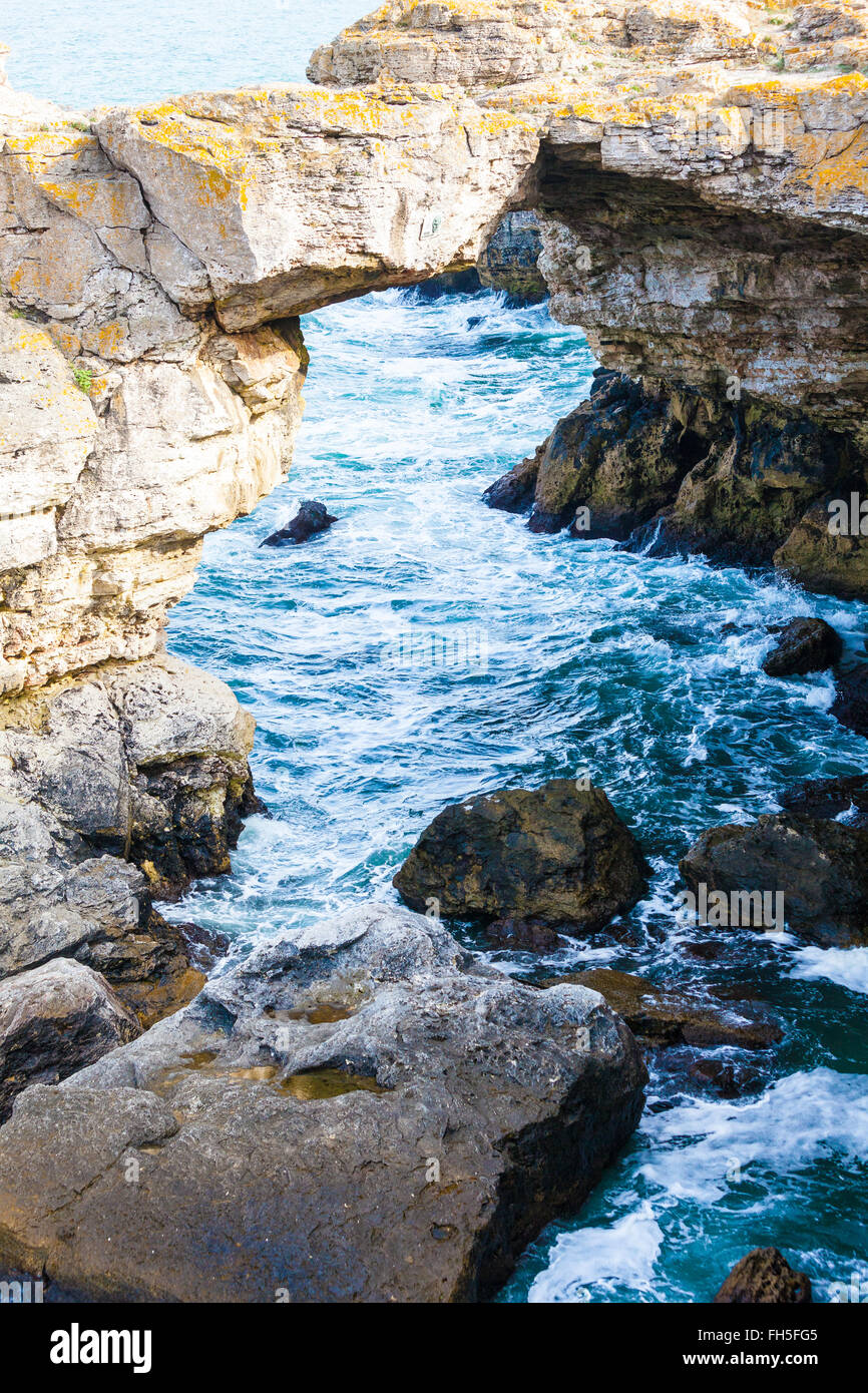 Rock and waves Stock Photo - Alamy