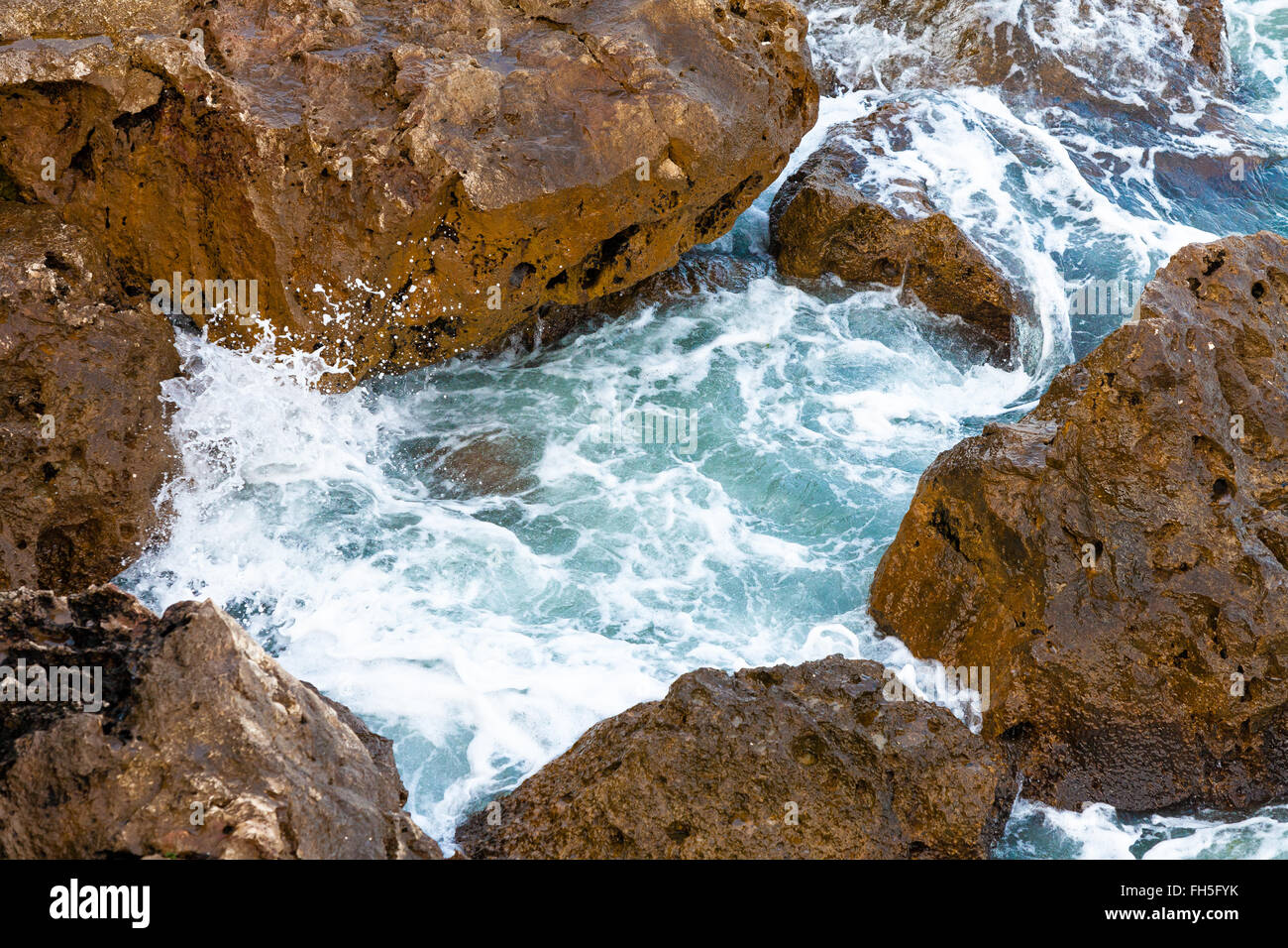 Rock and waves Stock Photo - Alamy