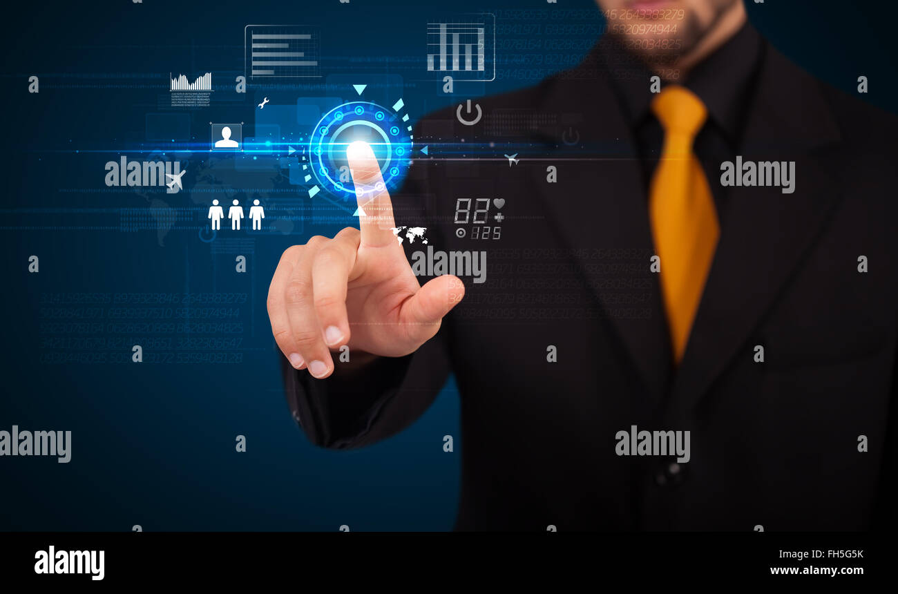 Handsome businessman touching future web technology buttons and icons ...