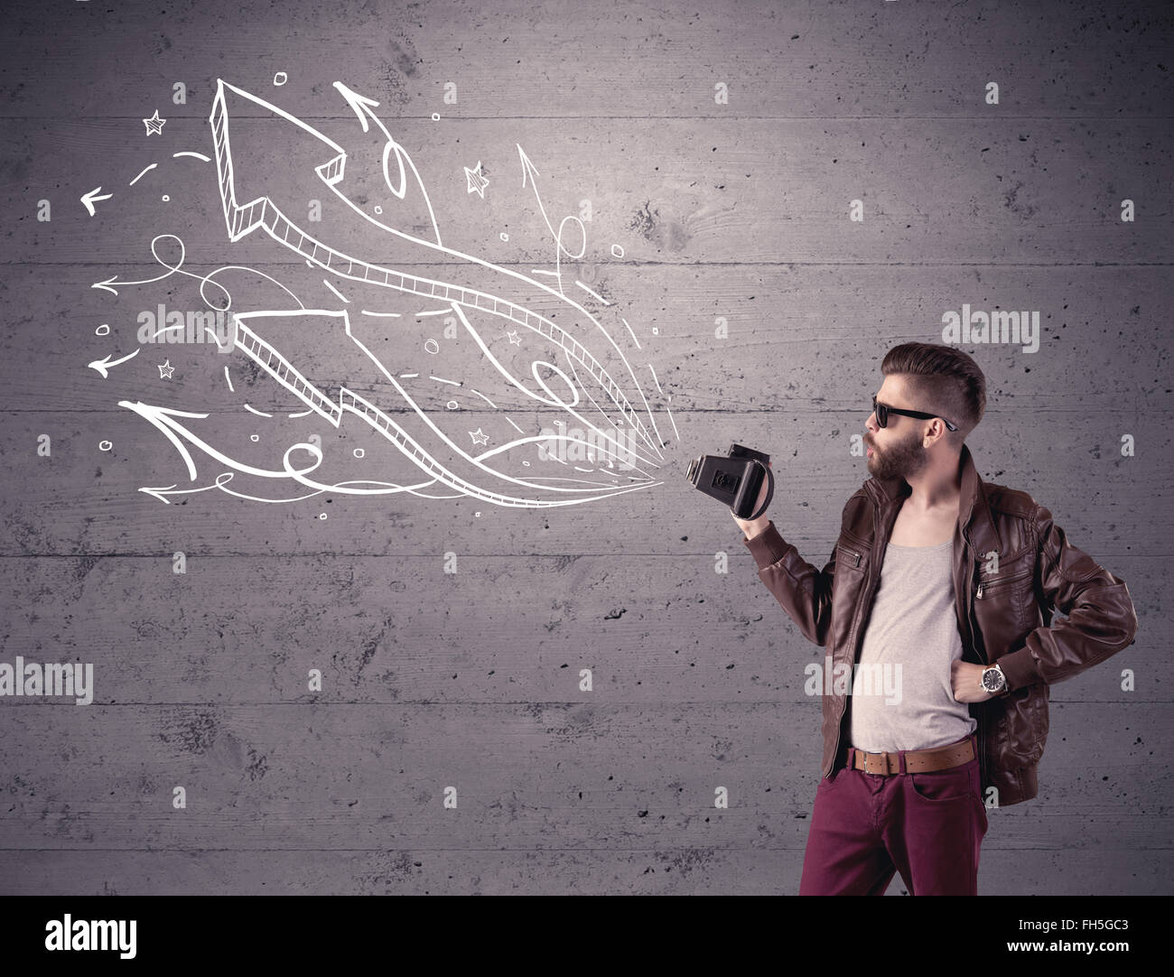 Funny guy taking photos with retro camera Stock Photo - Alamy